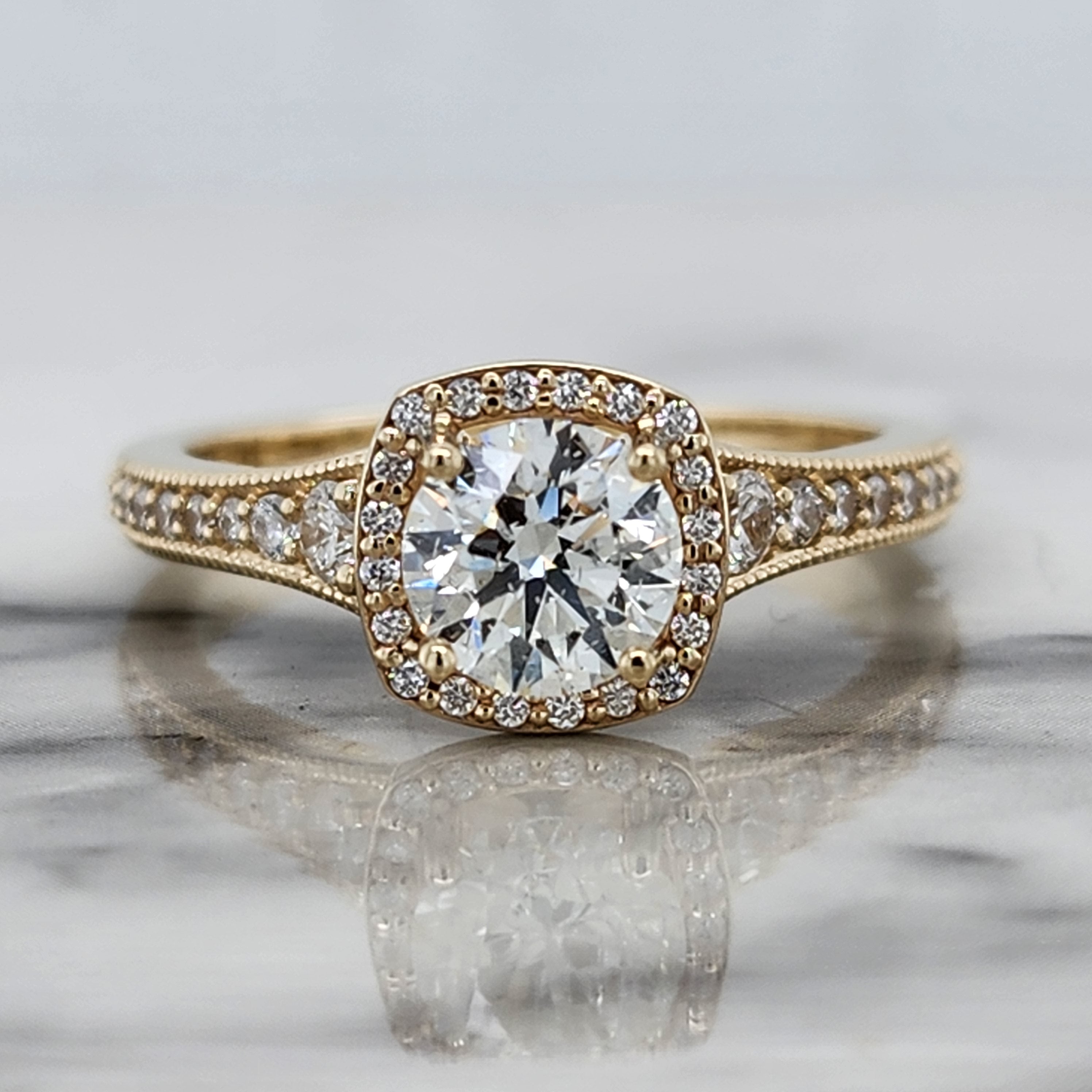 Yellow Gold Engagement Ring With Round Center Stone, Round Accents, an ...